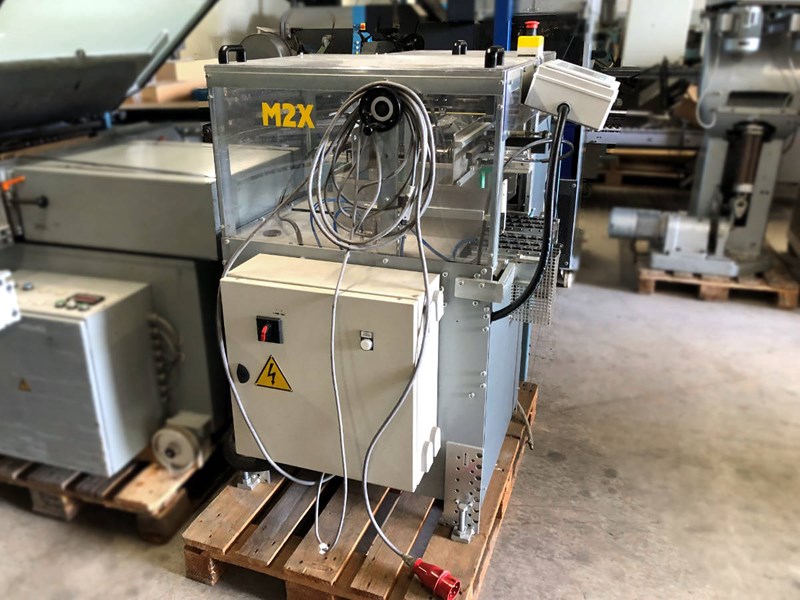 Used Tecnograf M2X stacker year 2004 | PressCity