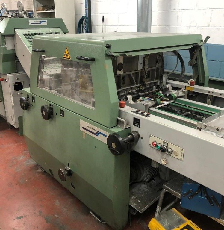 Used Muller Martini Bravo saddle stitcher year 2000 | PressCity